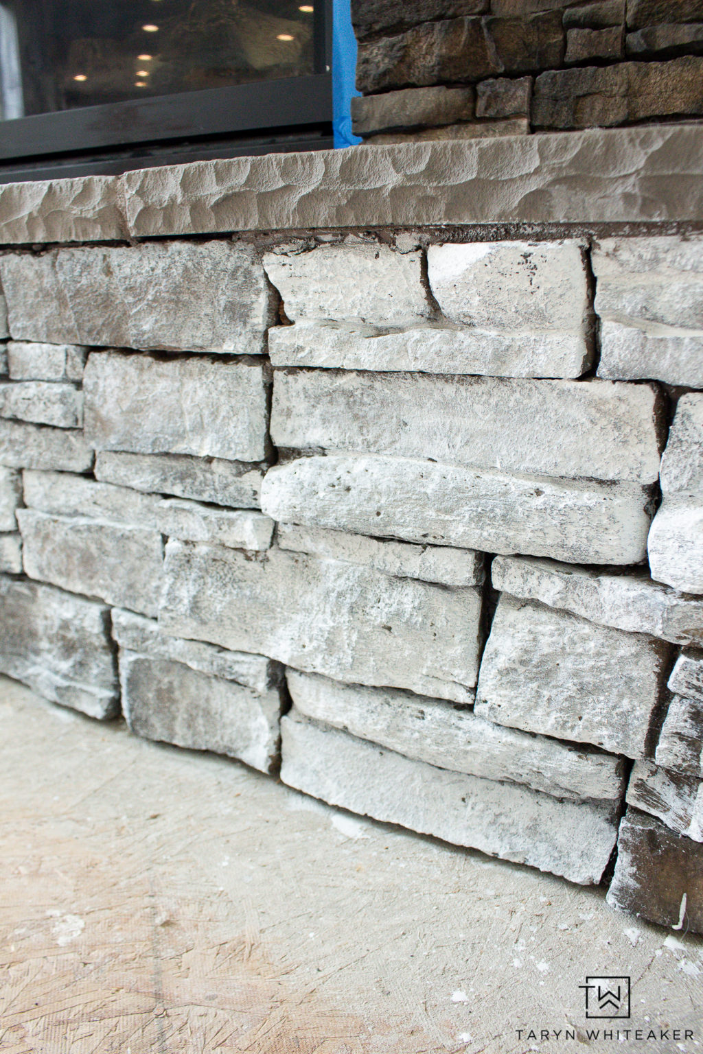 White Wash Stone Fireplace - Taryn Whiteaker Designs